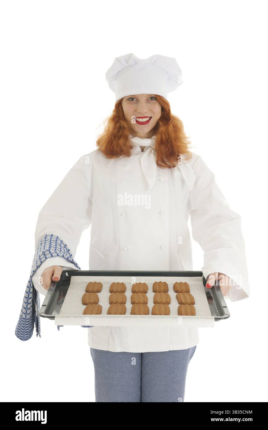 Female baker chef with red hair isolated over white background Stock ...