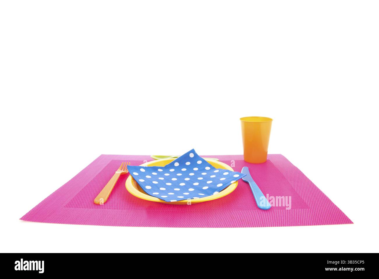 Set table with place mat, plate and cutlery Stock Photo - Alamy