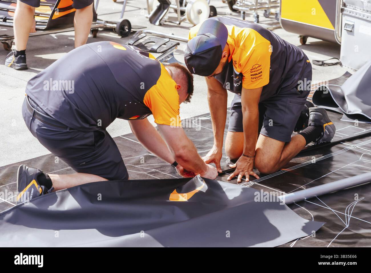 MELBOURNE, AUSTRALIA - MARCH 12: McLaren Formula 1 Team personnel ...