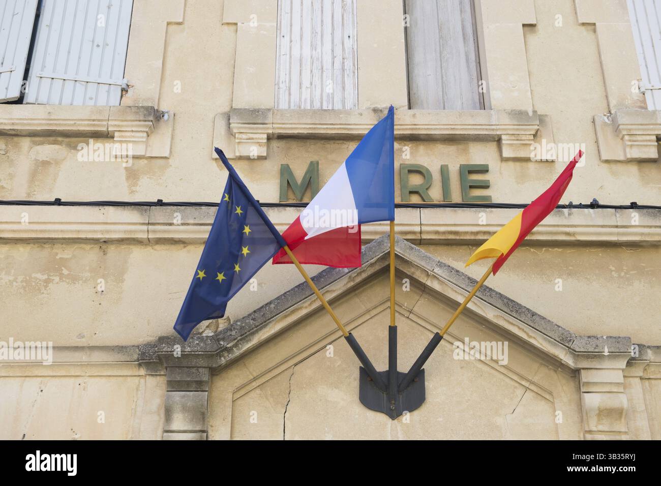 Town hall in French village with flags Stock Photo - Alamy