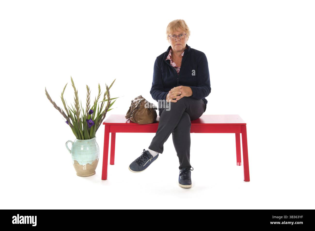 Seniors on a bench Cut Out Stock Images & Pictures - Alamy