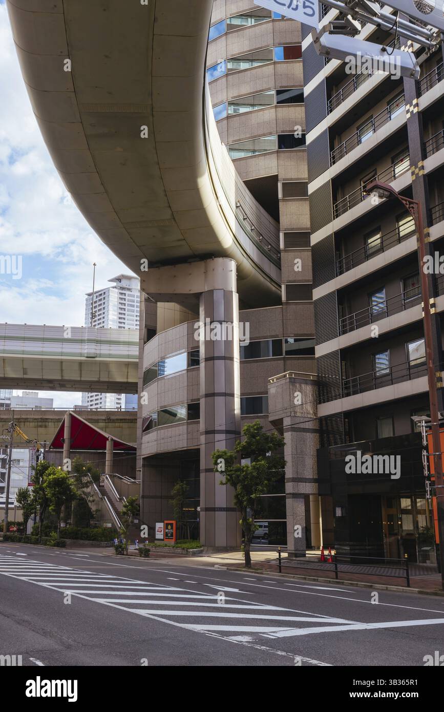 OSAKA, JAPAN - SEPTEMBER 25 2024: The famous 'highway thru a building ...