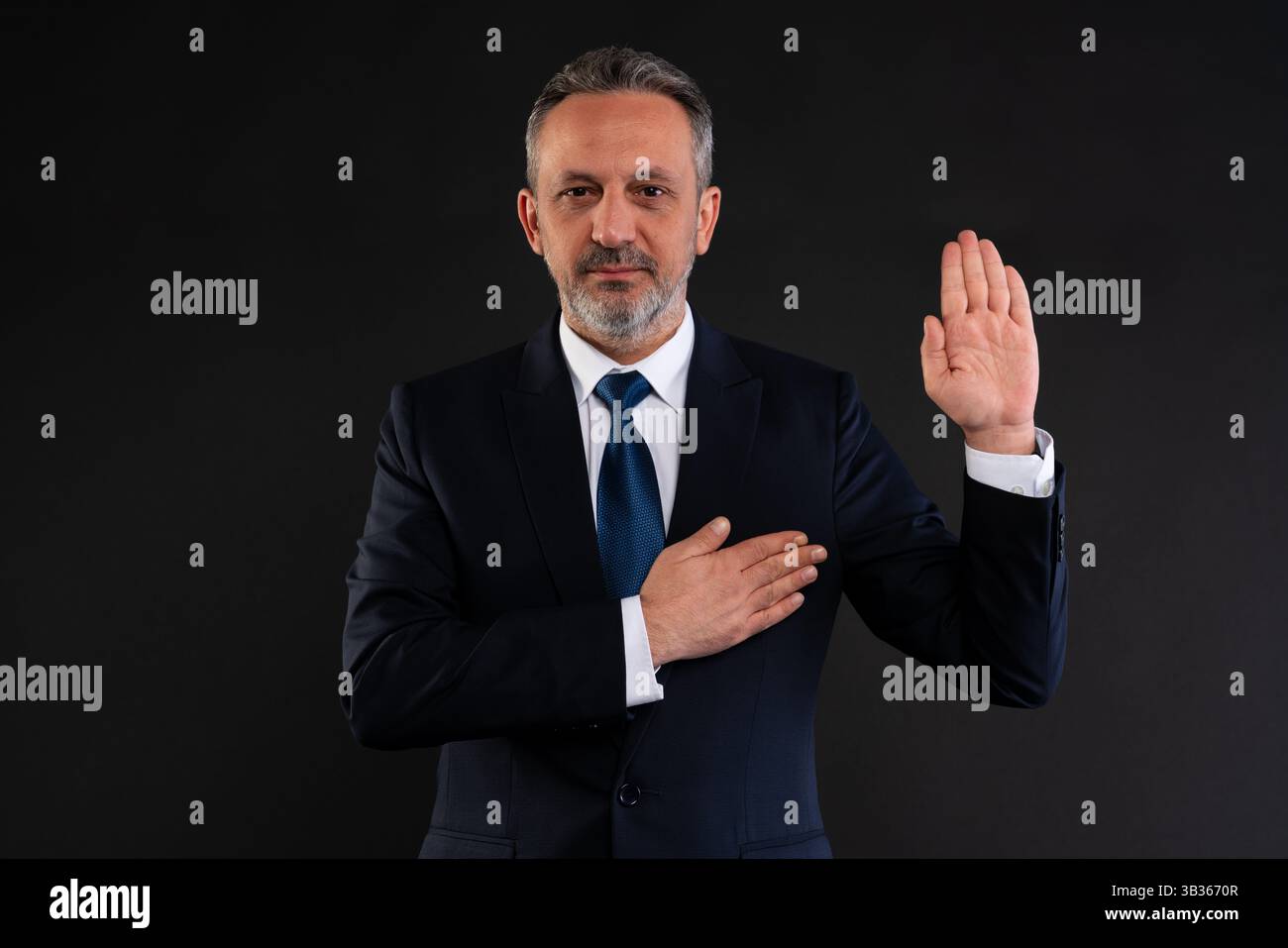 Businessman placing right hand on hi-res stock photography and images ...