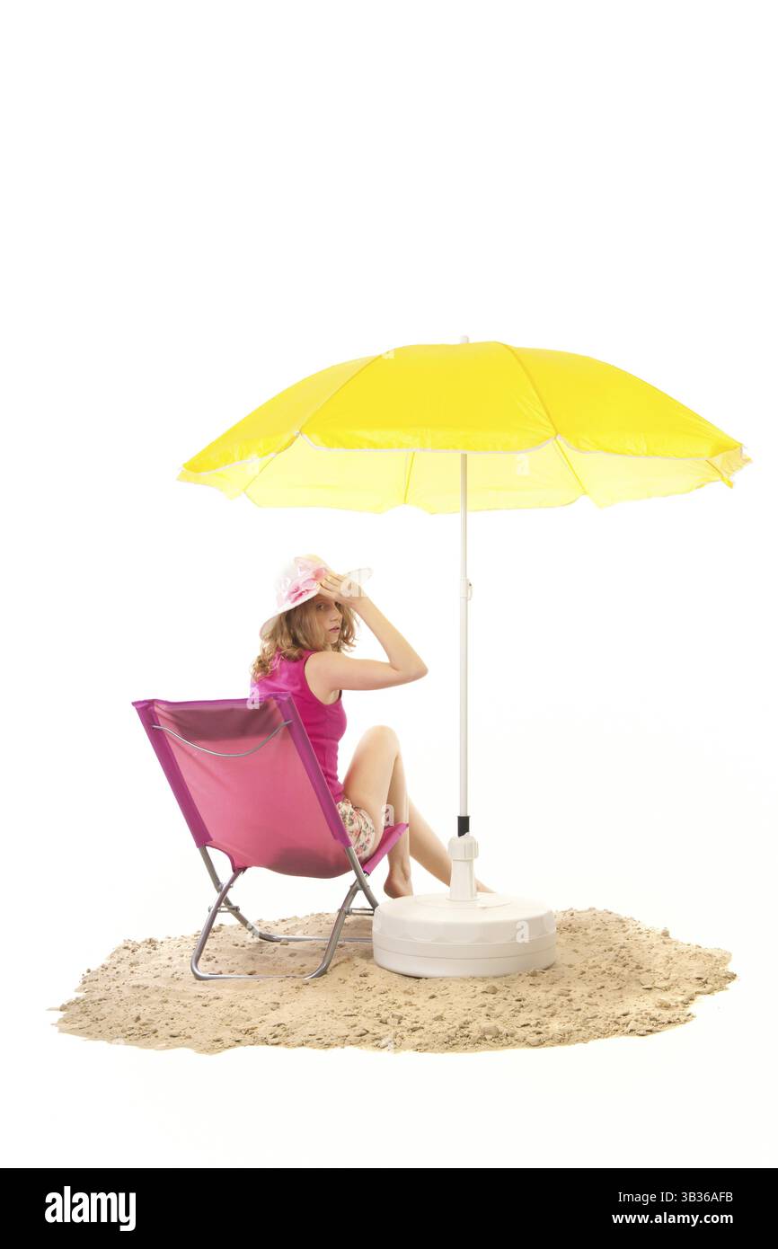 Beach people sunbathing under Cut Out Stock Images & Pictures - Alamy