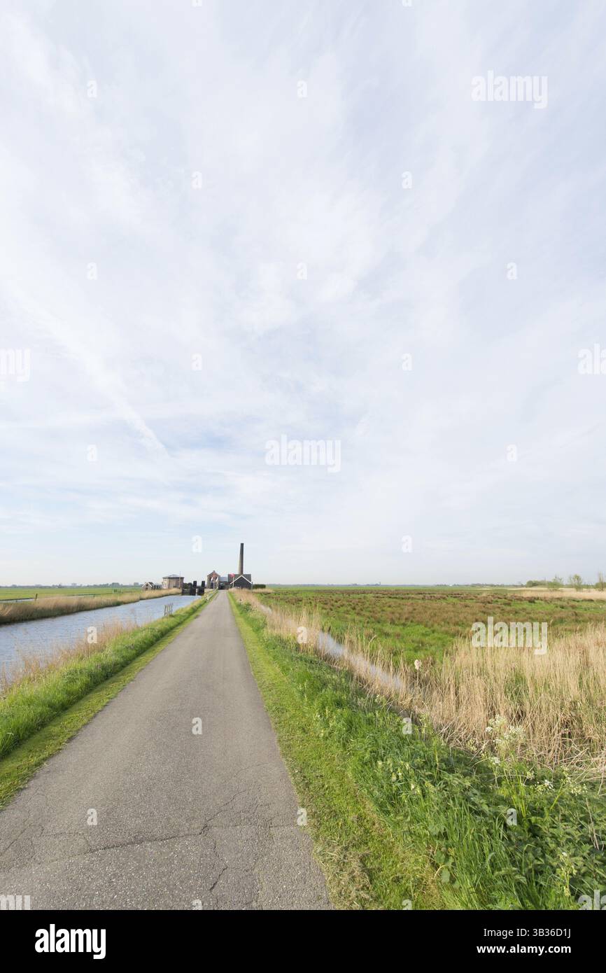 Dutch pumping station in polder landscape Stock Photo - Alamy