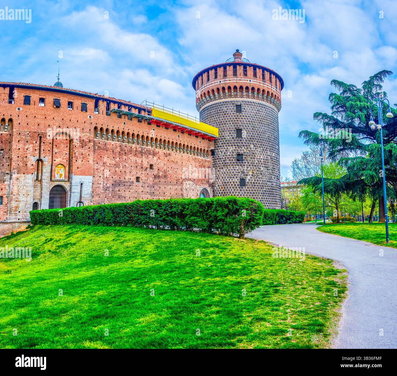 Sforza Castle with medieval walls and Tower of Holy Spirit in Sempione ...
