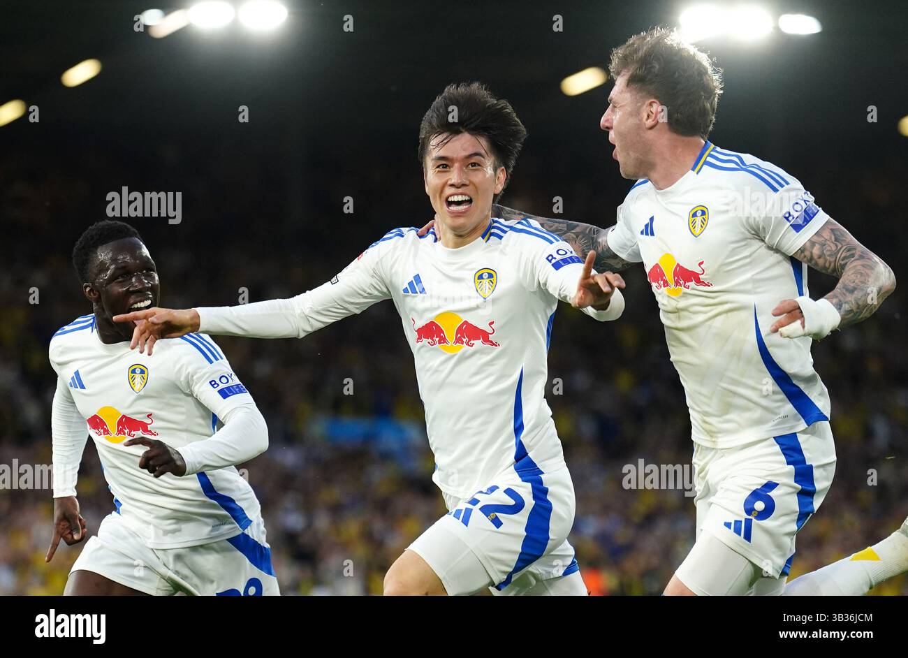 Leeds United's Ao Tanaka (centre) celebrates scoring their side's first ...