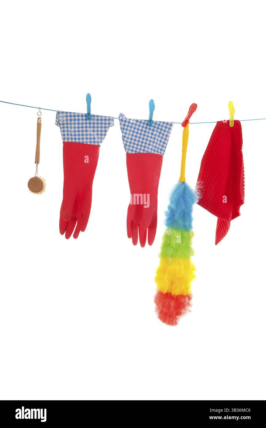 Cleaning attributes hanging at laundry line Stock Photo - Alamy