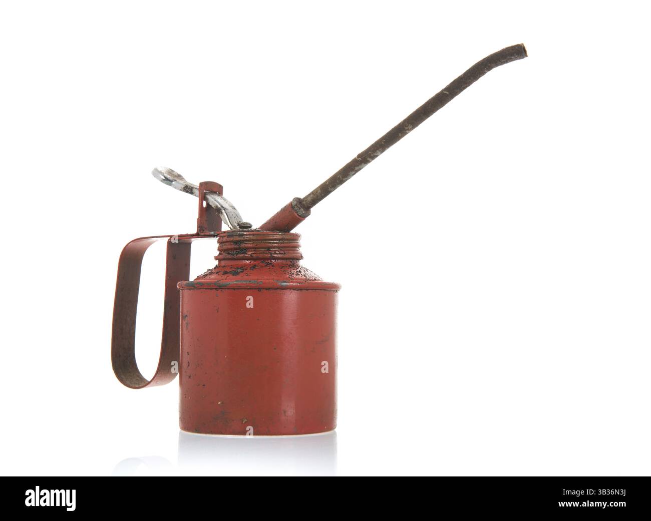 Red vintage oiler isolated over white background Stock Photo - Alamy