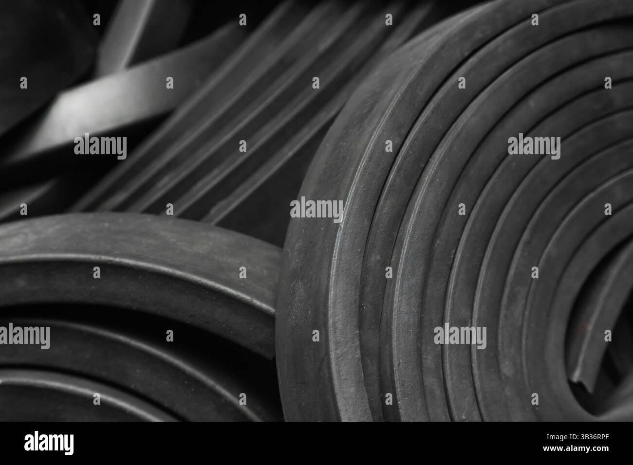 Close-up rubber sealing strips for waterproof doors. A pile of rubber ...