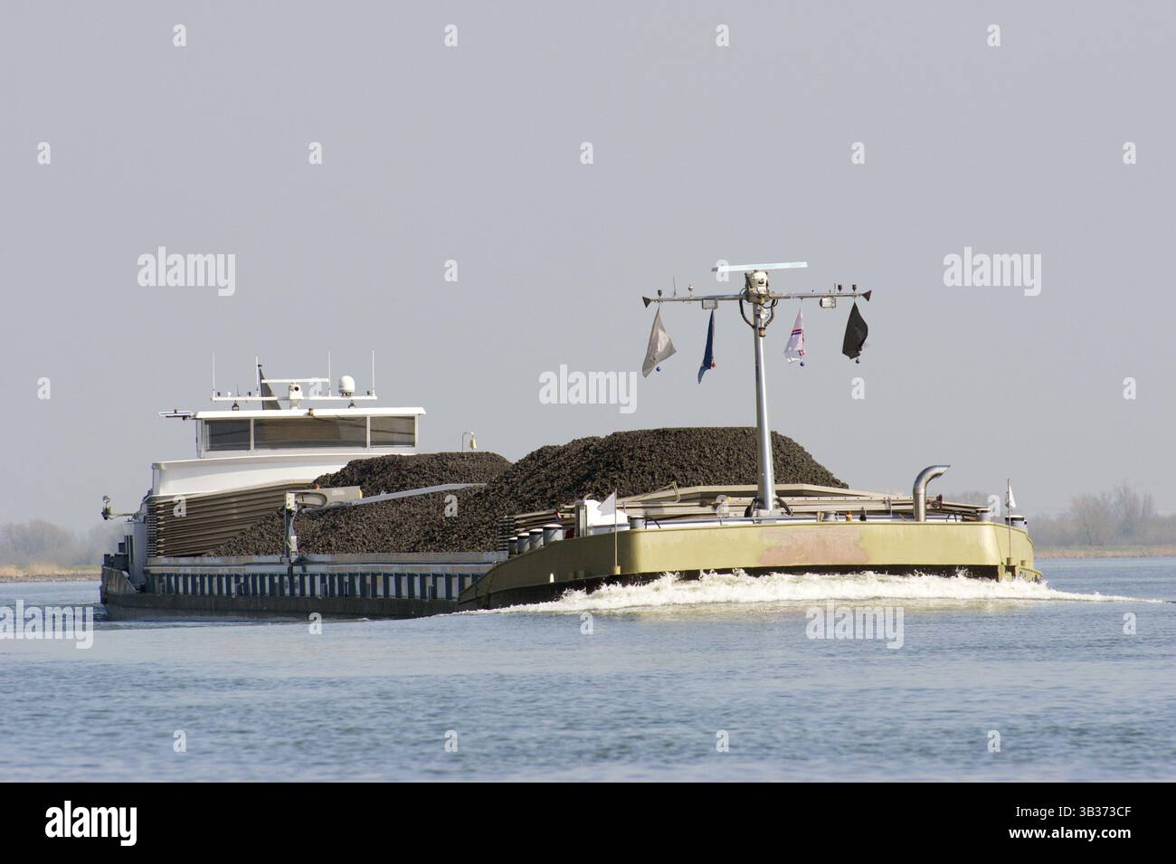 Big cargo ship in Dutch river Stock Photo - Alamy