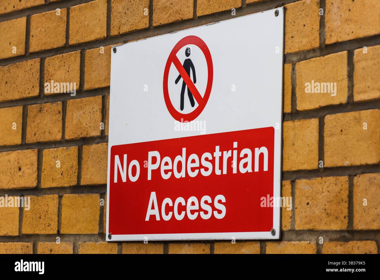 Safety sign indicating no pedestrian access on restricted area with ...