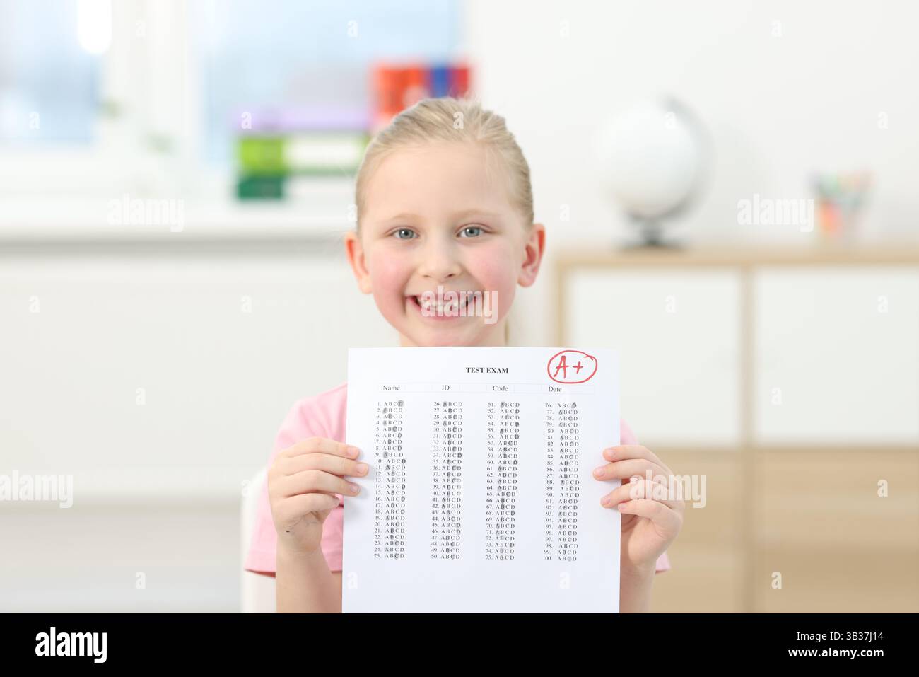 School grade. Happy girl holding answer sheet with letter A and plus ...