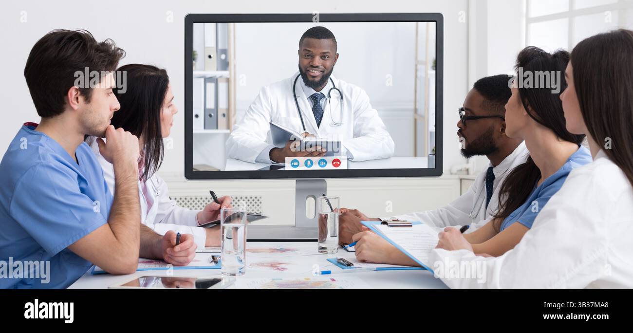 Doctors Team Having Virtual Meeting With Colleague In Clinic Office ...