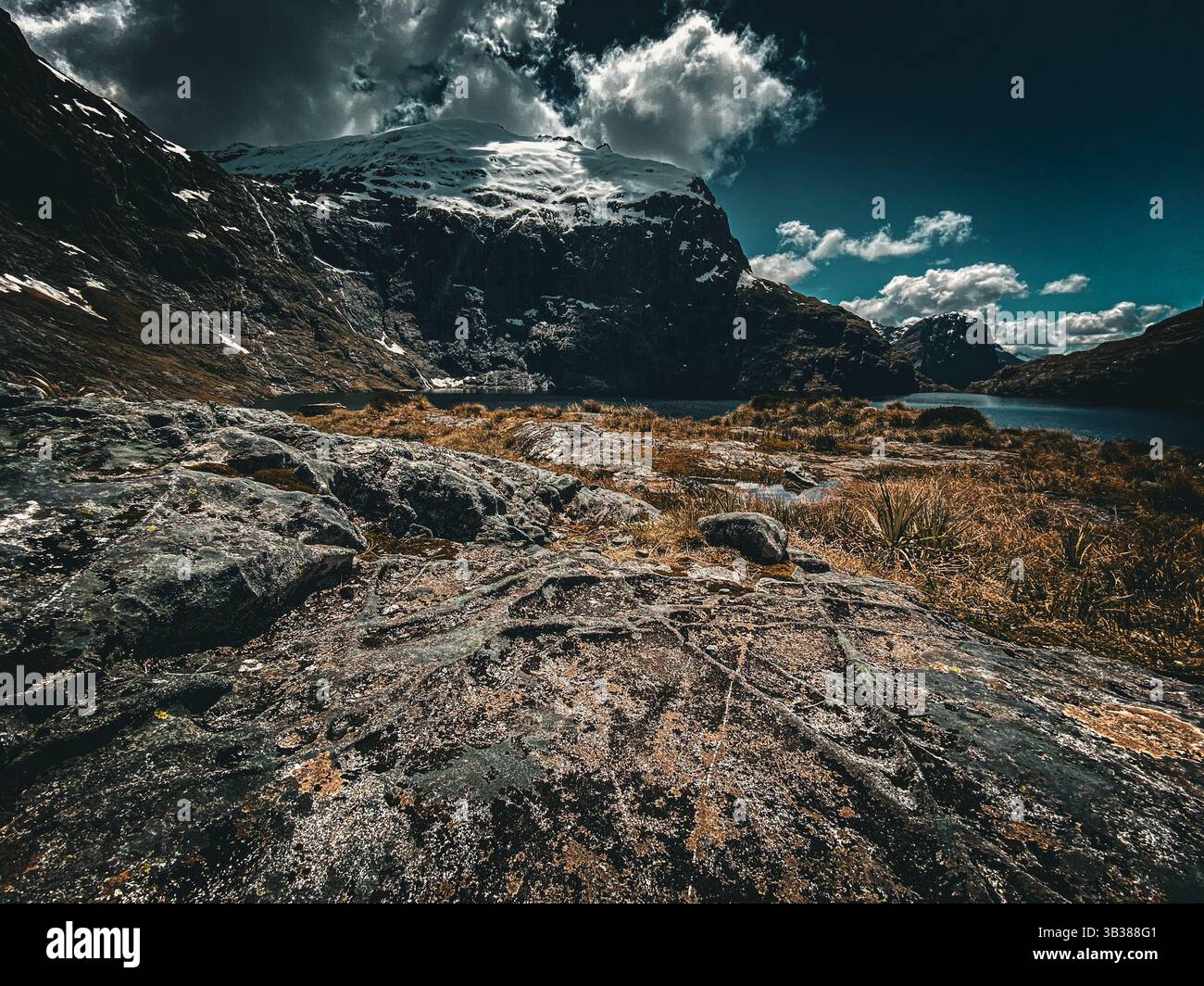 Aerial views through Milford Sound fjords, over lake Quill and ...