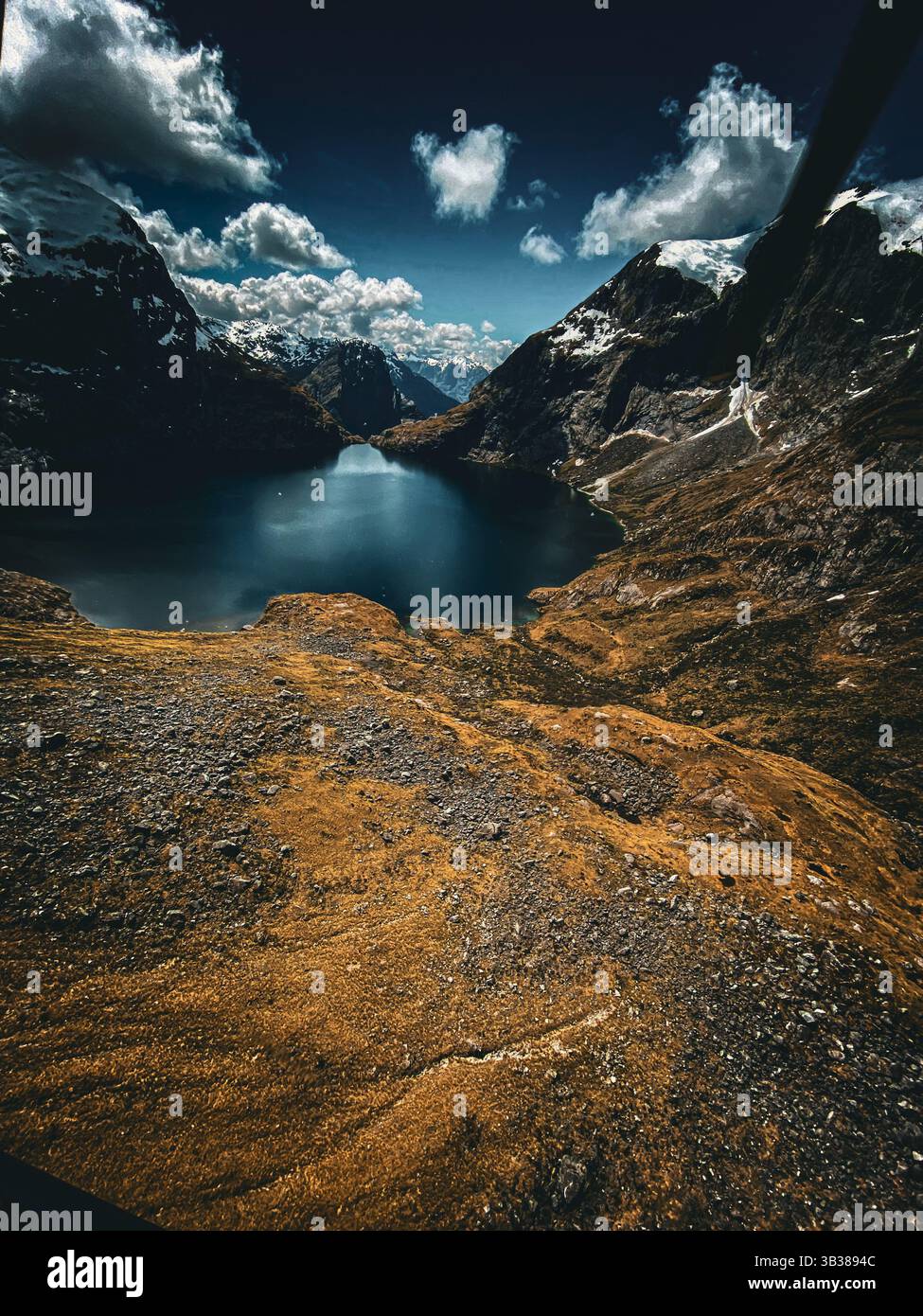 Aerial views through Milford Sound fjords, over lake Quill and ...