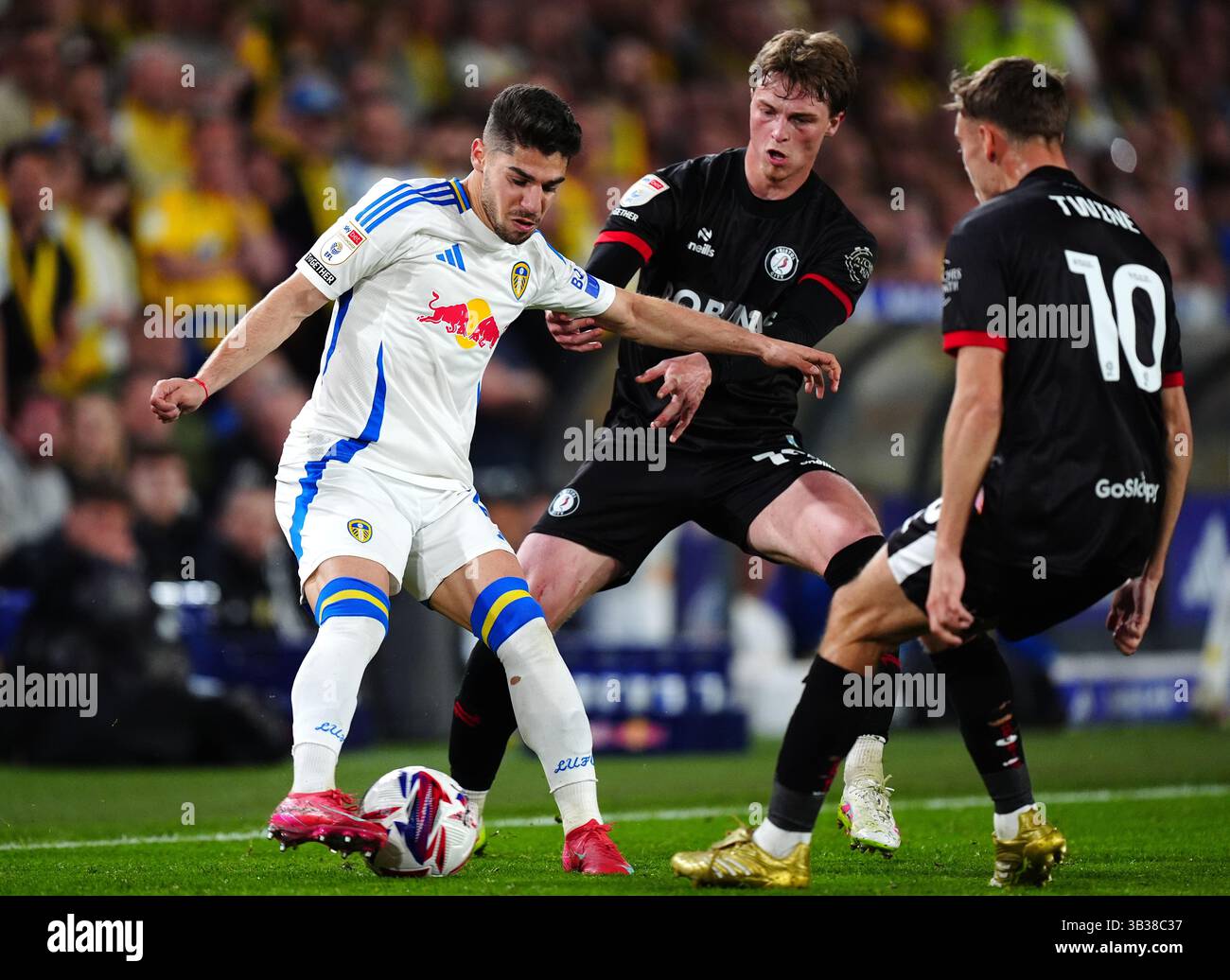 Leeds United's Manor Solomon, Bristol City's George Tanner and Scott ...