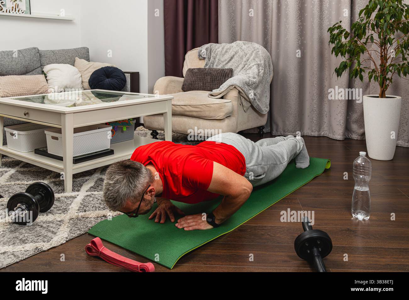 Elderly man performs exercise on hi-res stock photography and images ...