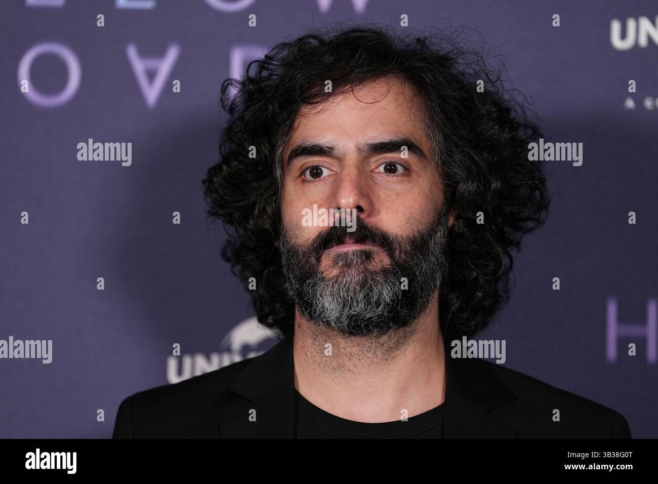 Director Babak Anvari poses for photographers upon arrival at the UK ...
