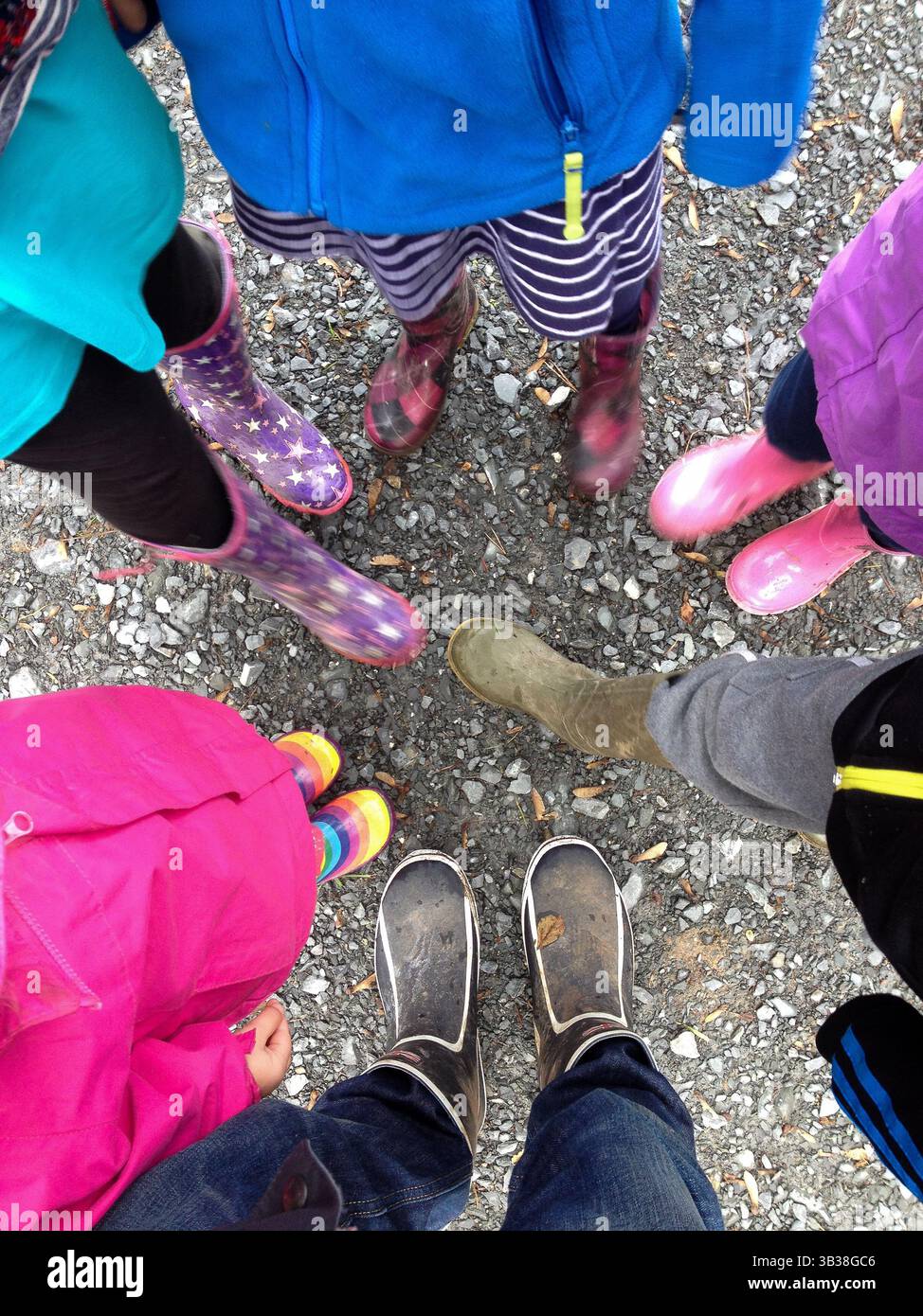 A family and cildren group out on a country walk wearing wellies Stock ...