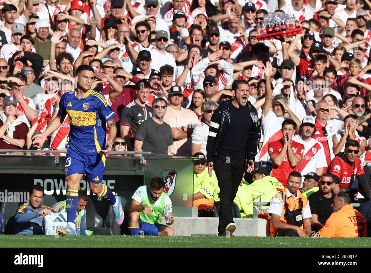 Boca Juniors' head coach Fernando Gago (R) gives instructions during ...