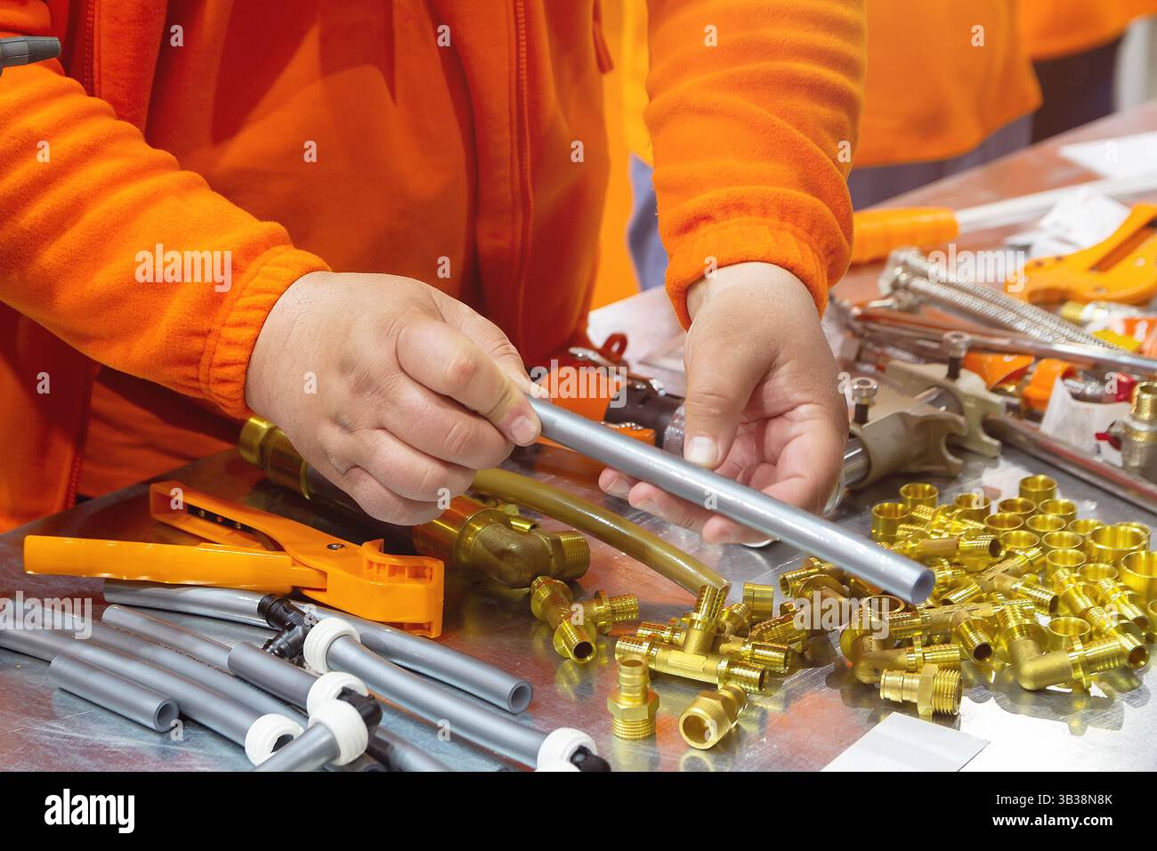 Master demonstrates components for installation of cross-linked ...