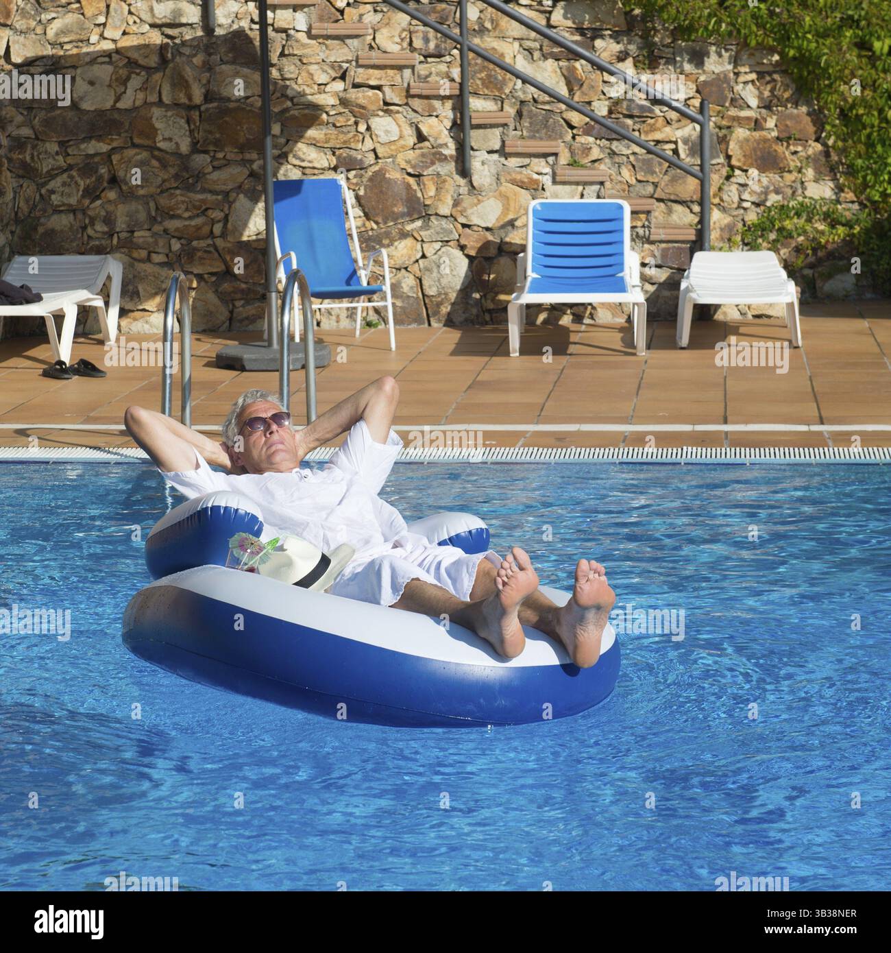 Wealthy man suit hi-res stock photography and images - Alamy