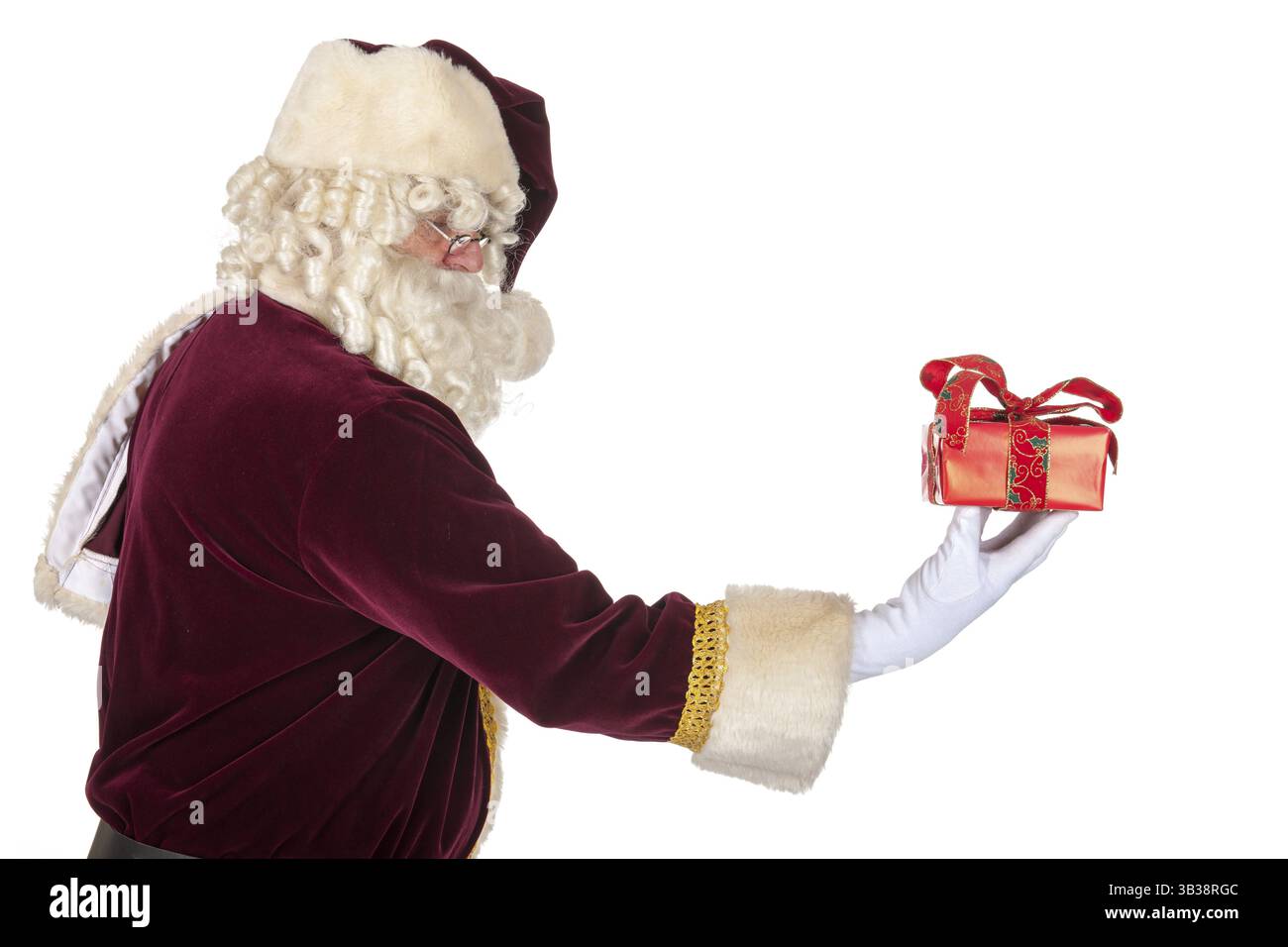 Santa claus giving out Cut Out Stock Images & Pictures - Alamy