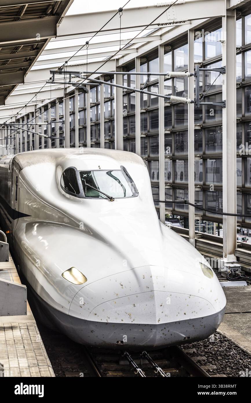 KYOTO, JAPAN - SEPTEMBER 24 2024: A Shinkansen high-speed bullet train arriving at Kyoto Station ...
