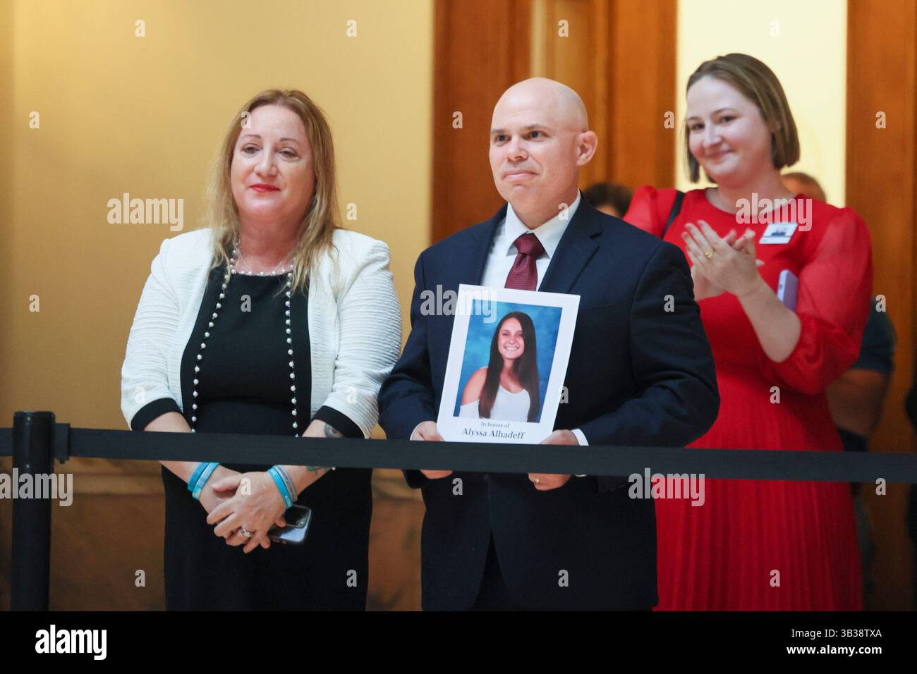 Ilan Alhadeff holds a photograph of his daughter Alyssa Alhadeff, next ...