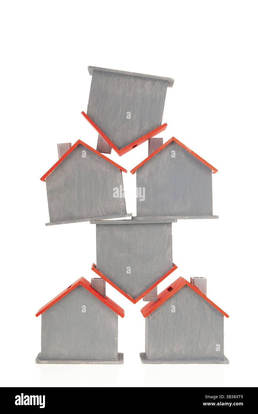 Row wooden houses same in gray and red isolated over white background ...
