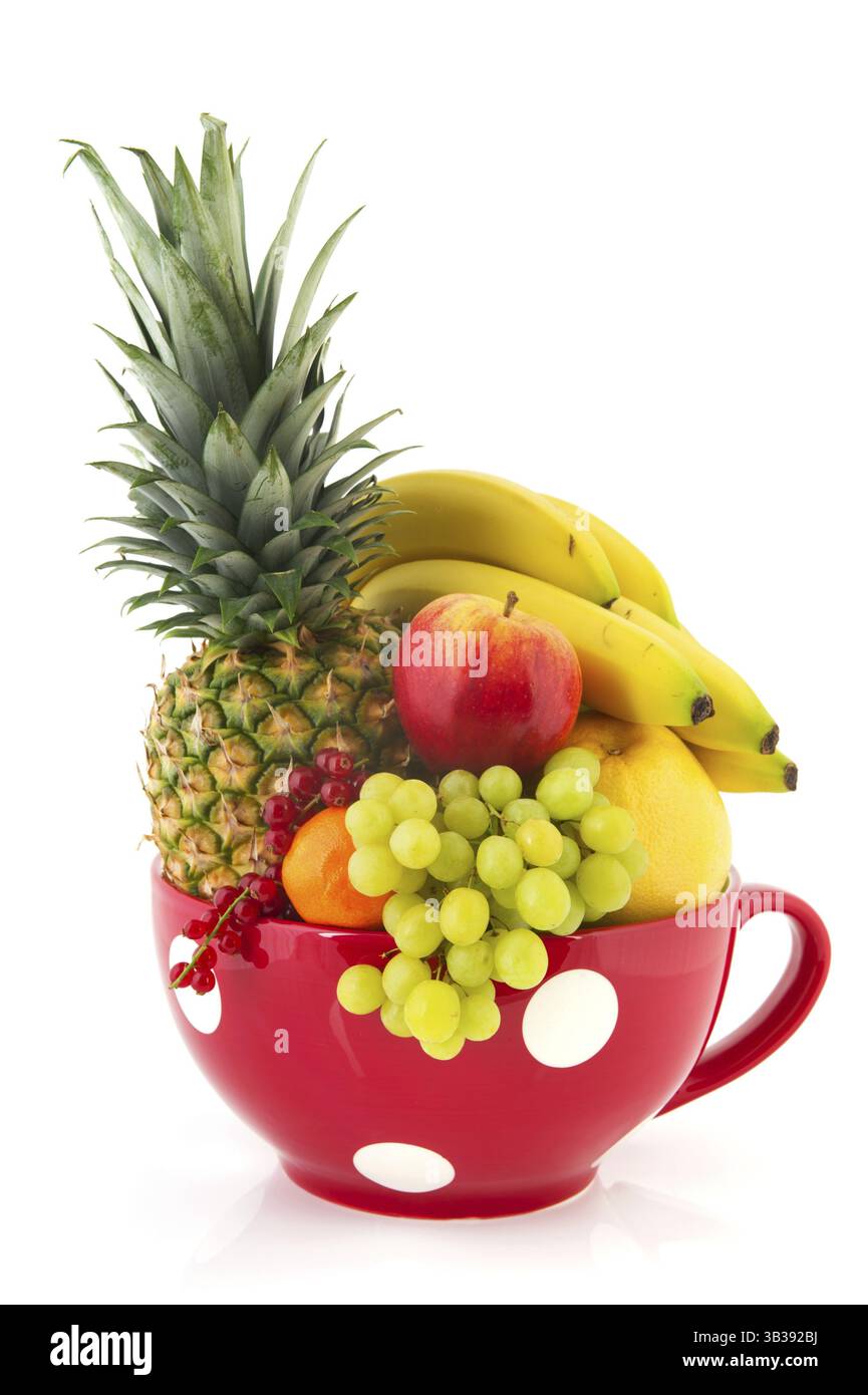 Fruit assortment in big red cup Stock Photo - Alamy
