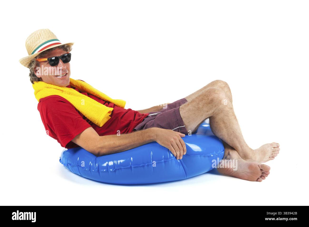 Adult man is sitting on a float Stock Photo - Alamy