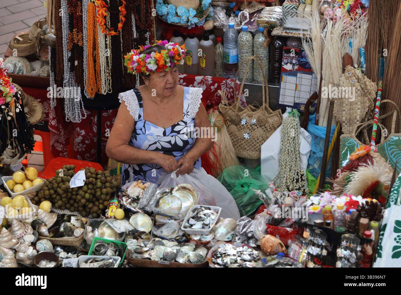 March 11, 2017 - Tahiti, French Polynesia - Woman on a stall at Papeete ...