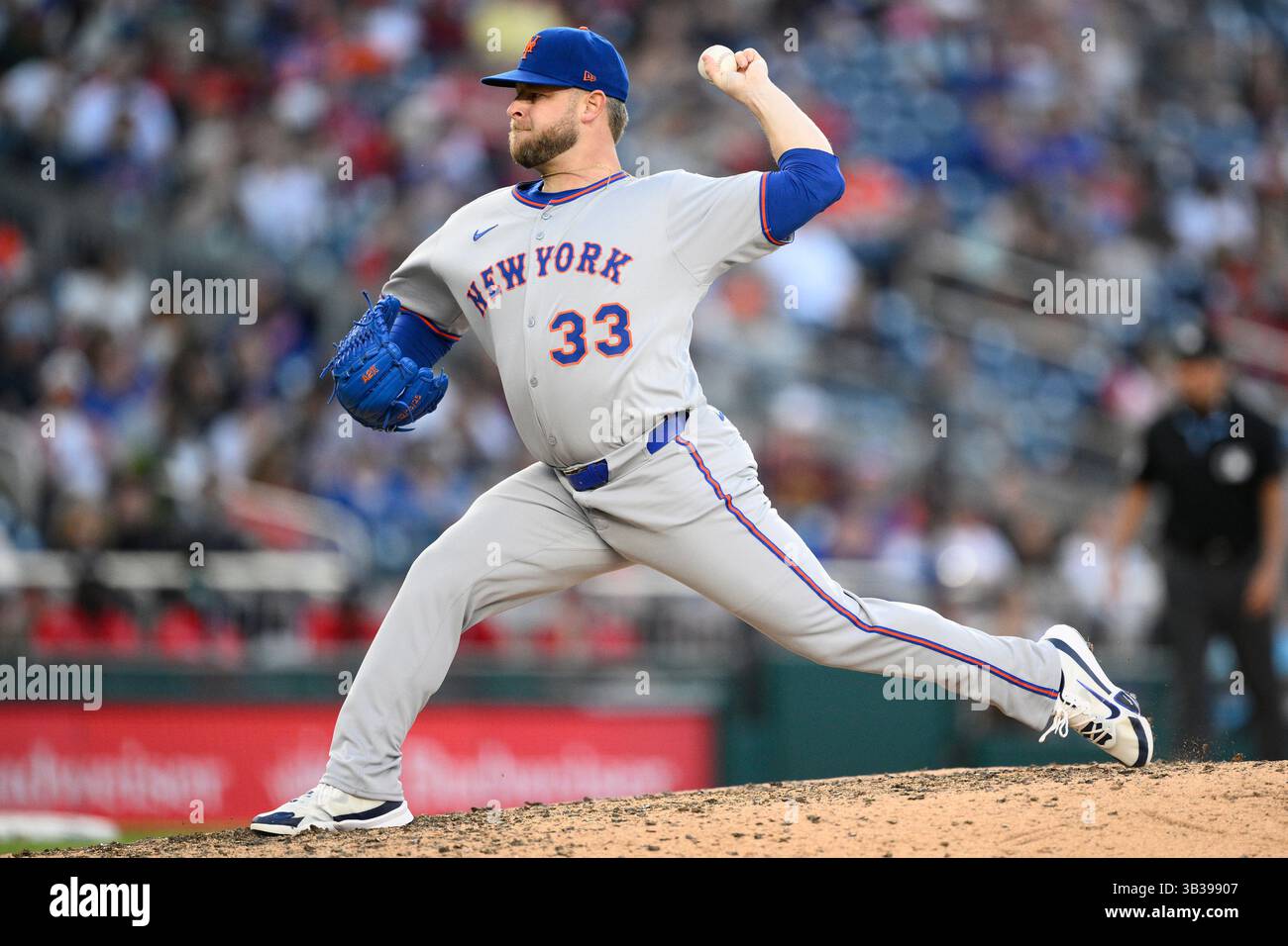 New York Mets relief pitcher A.J. Minter (33) in action during a baseball game against the ...