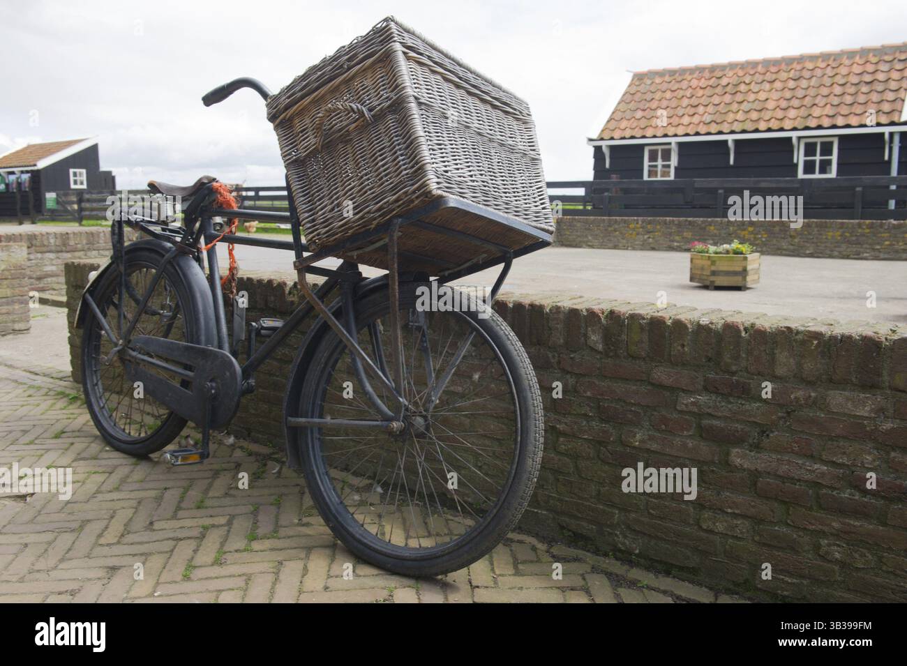 Typical old Dutch transport bike with big basket Stock Photo - Alamy