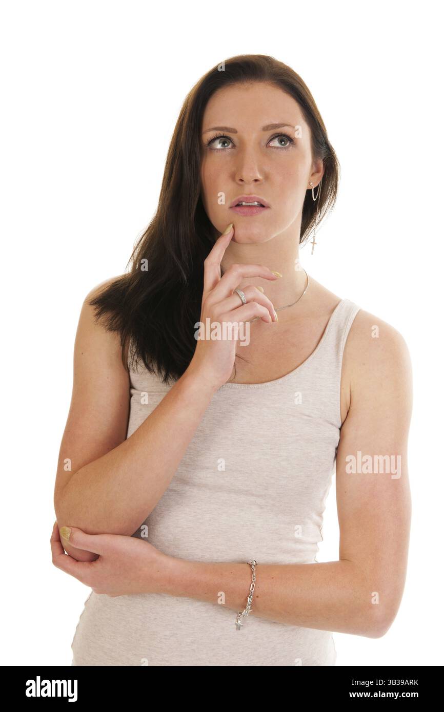 Attractive girl thinking about something isolated over white background ...