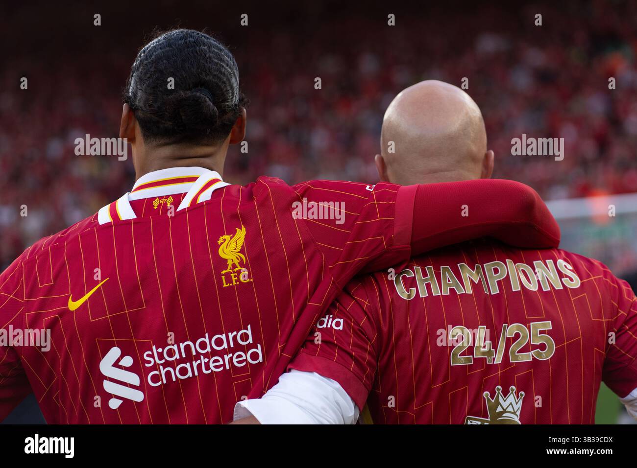 Liverpool manager Arne Slot (r) and Virgil van Dijk after the Premier ...