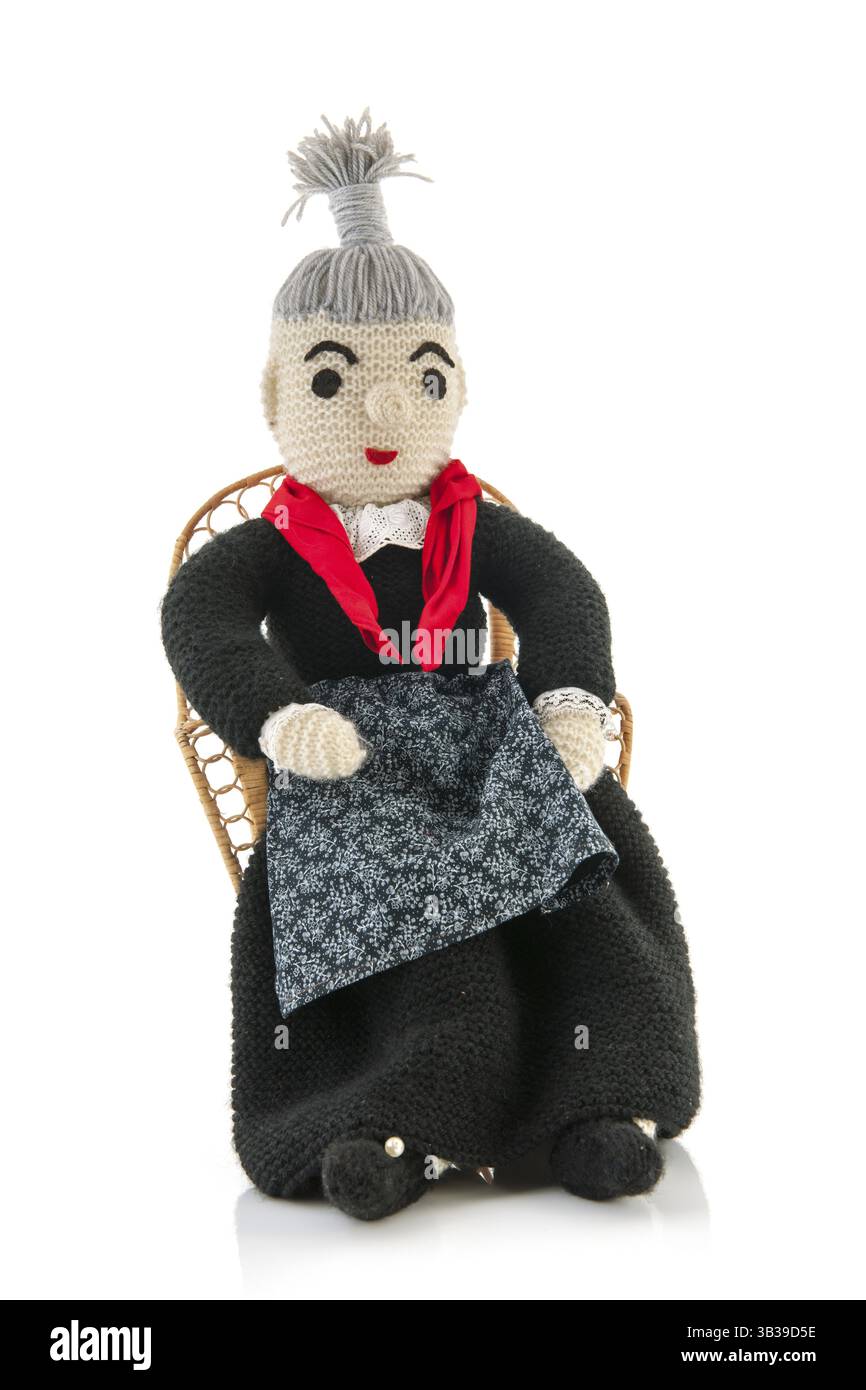 Hand knitted grandma sitting on chair Stock Photo - Alamy