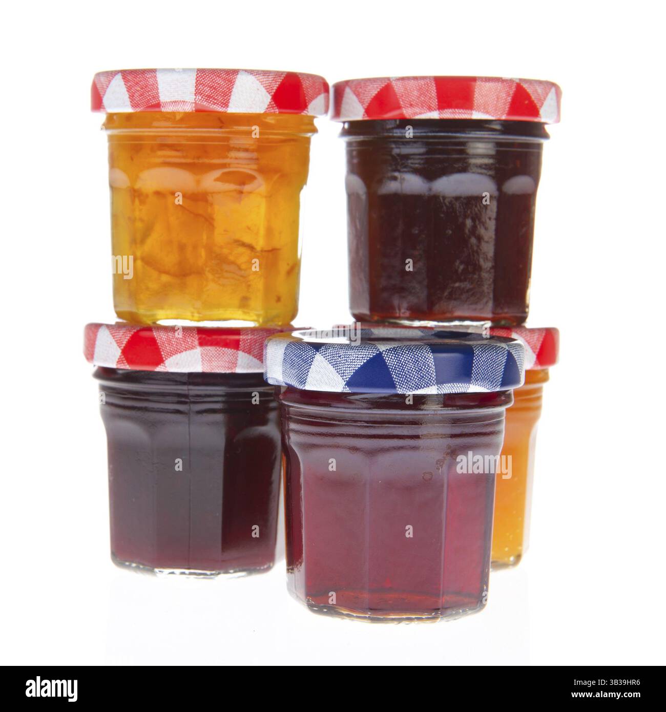 Five various pots of jam on white background Stock Photo - Alamy