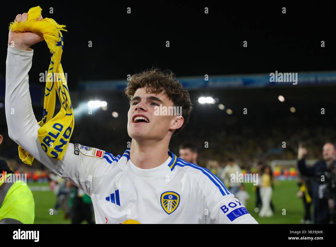 Leeds, UK. 28th Apr, 2025. Archie Gray celebrates promotion at full ...