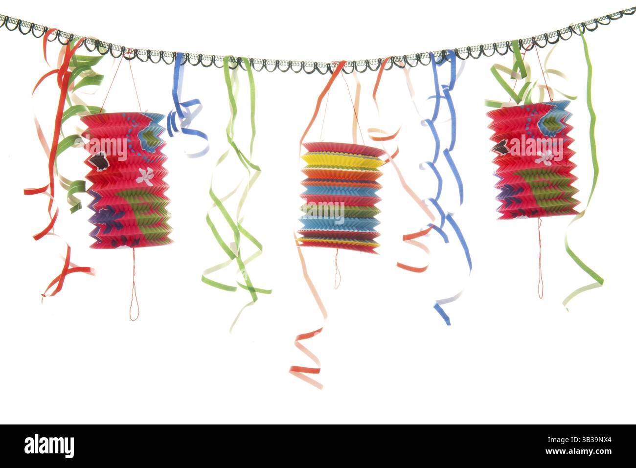 Hanging festive paper streamers isolated over white background Stock ...