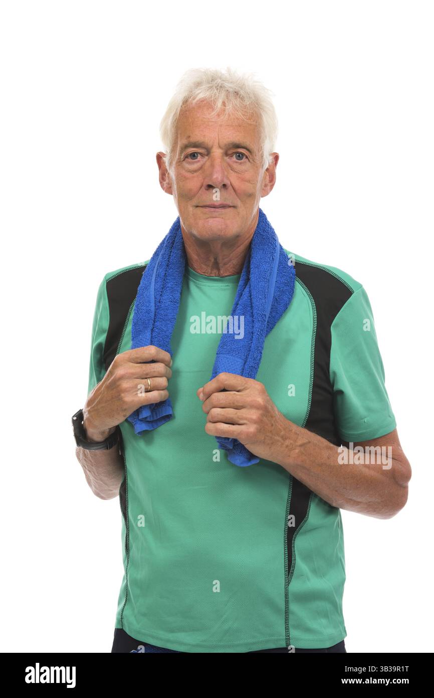 Portrait senior sport man drying head with towel against white ...