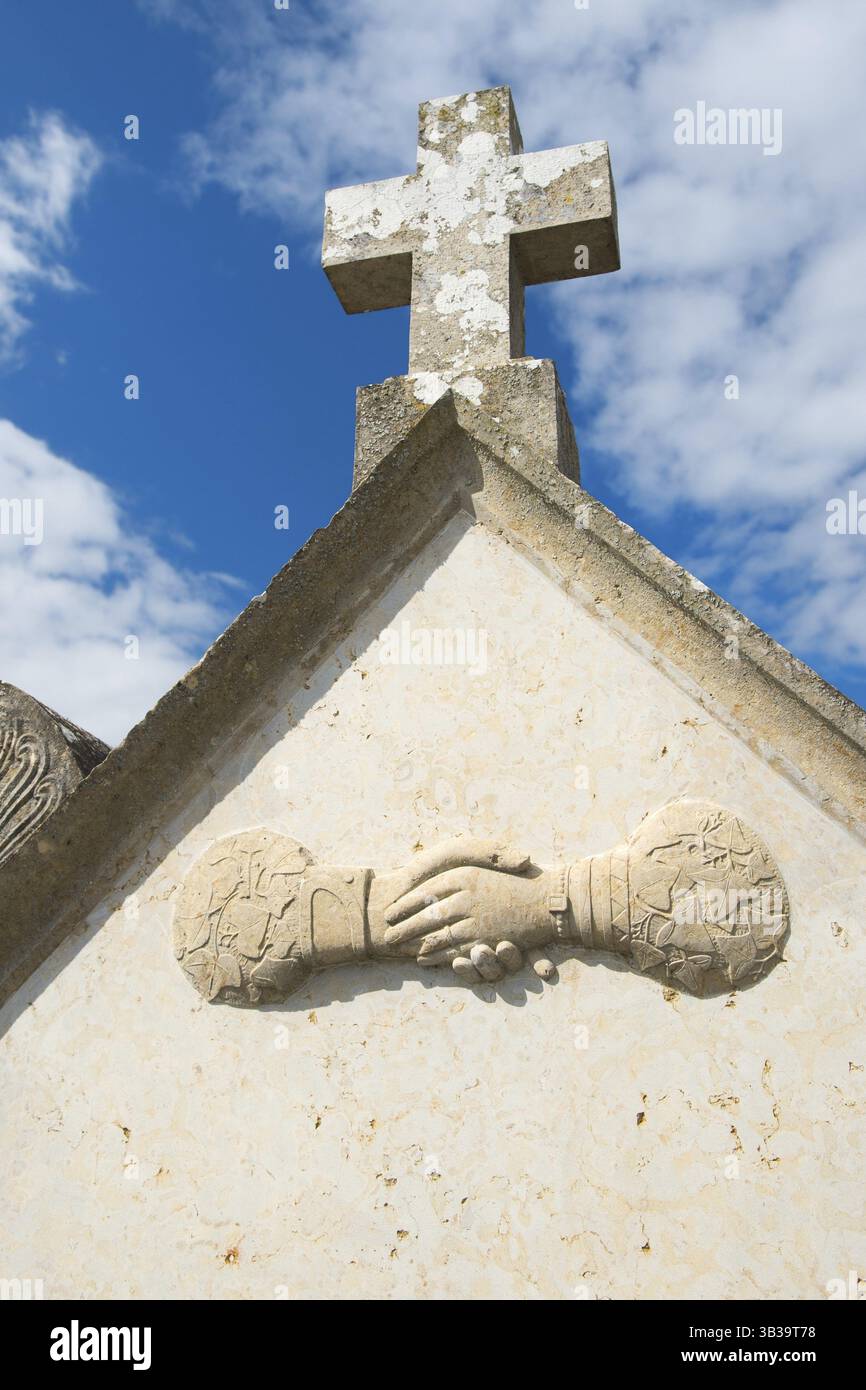 Stone cross with moss on old church Stock Photo - Alamy