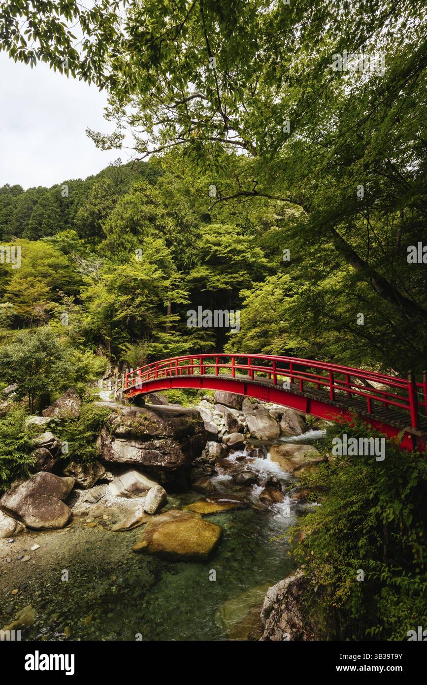 The magnificent Ryujin Falls and iconic red bridge at the start of ...