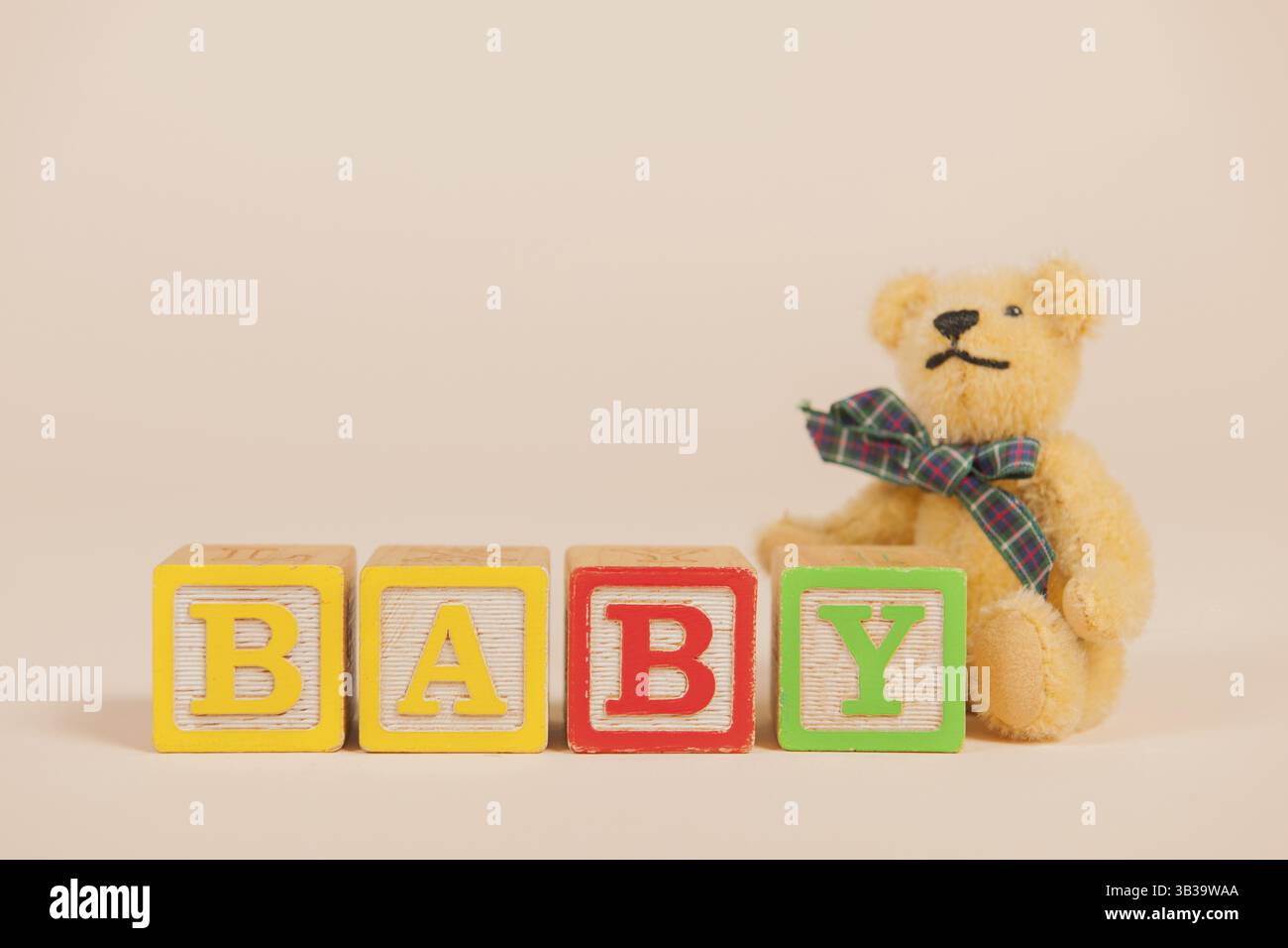 Hand made teddy bear and vintage blocks with text isolated over white ...
