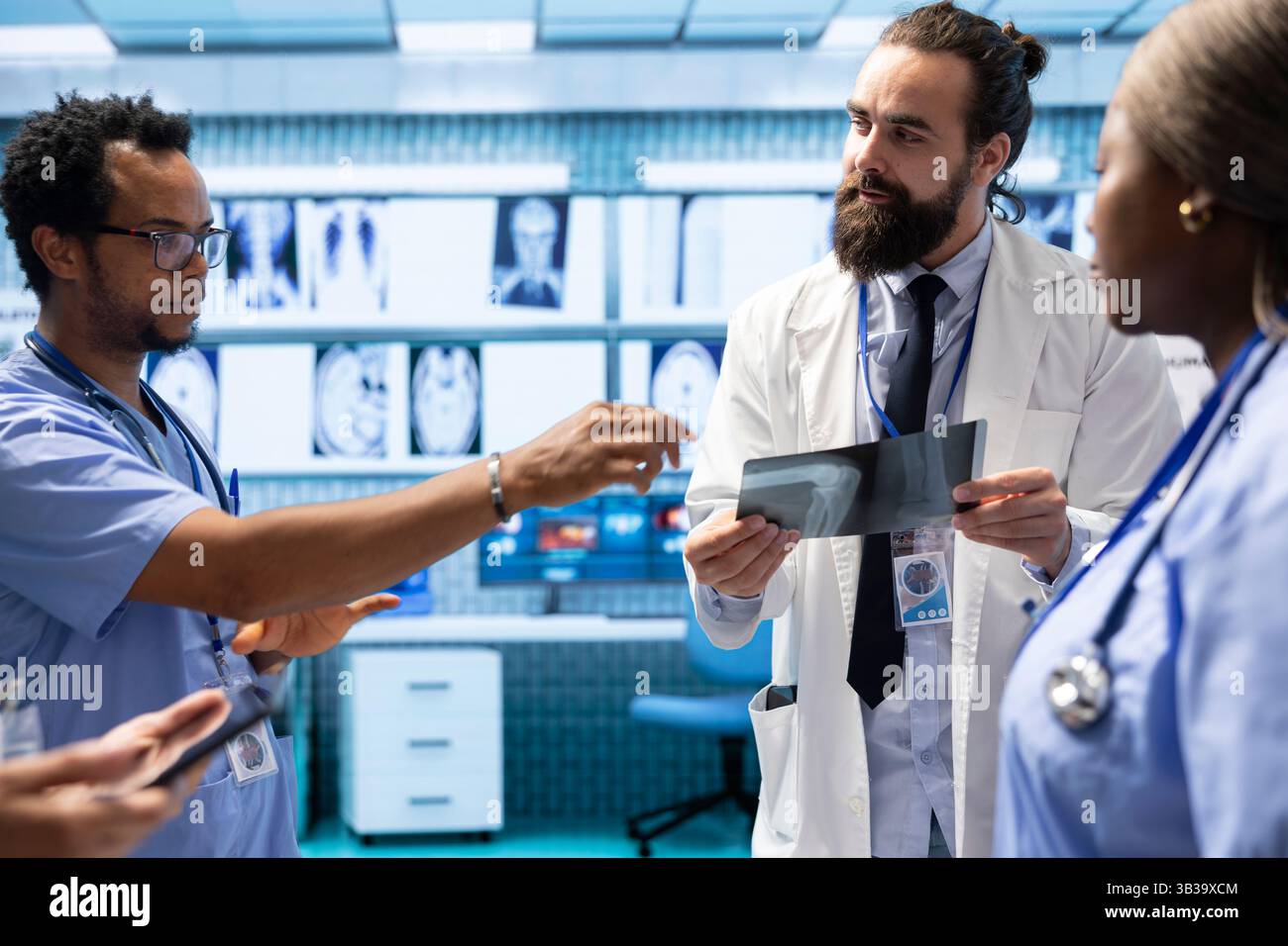 Medical team doing collective hi-res stock photography and images - Alamy