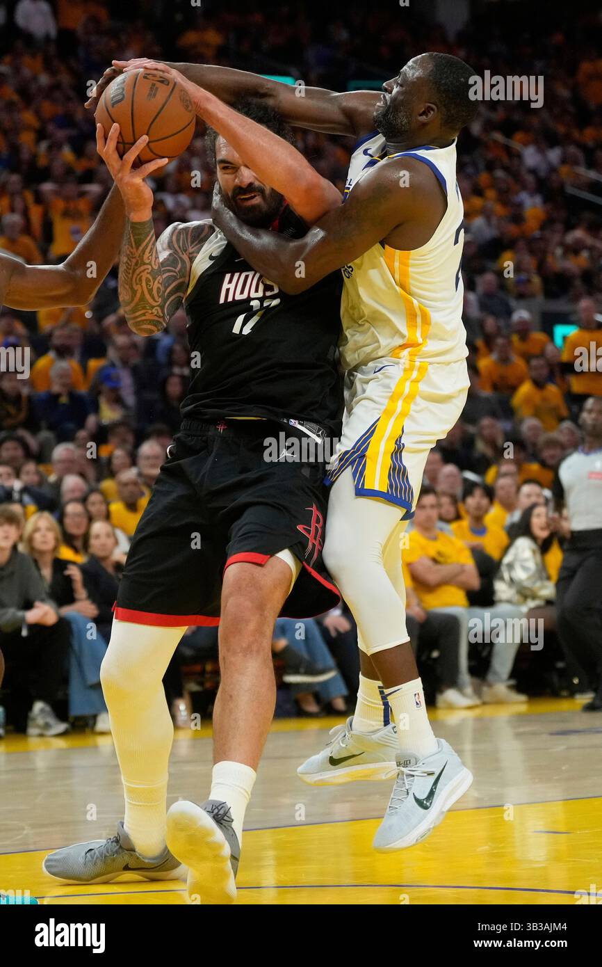 Houston Rockets center Steven Adams, left, is fouled by Golden State ...