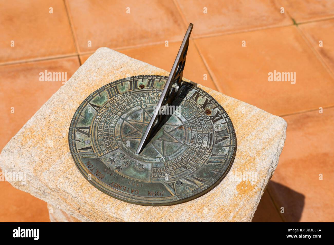 Classical sundial. The shade cast by the gnomon indicates a time a ...