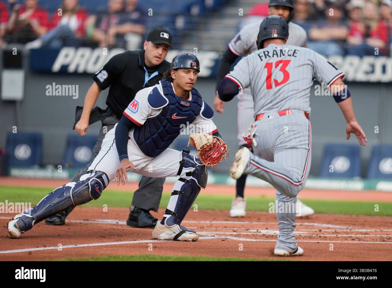 Cleveland Guardians catcher Bo Naylor prepares to tag out Minnesota ...